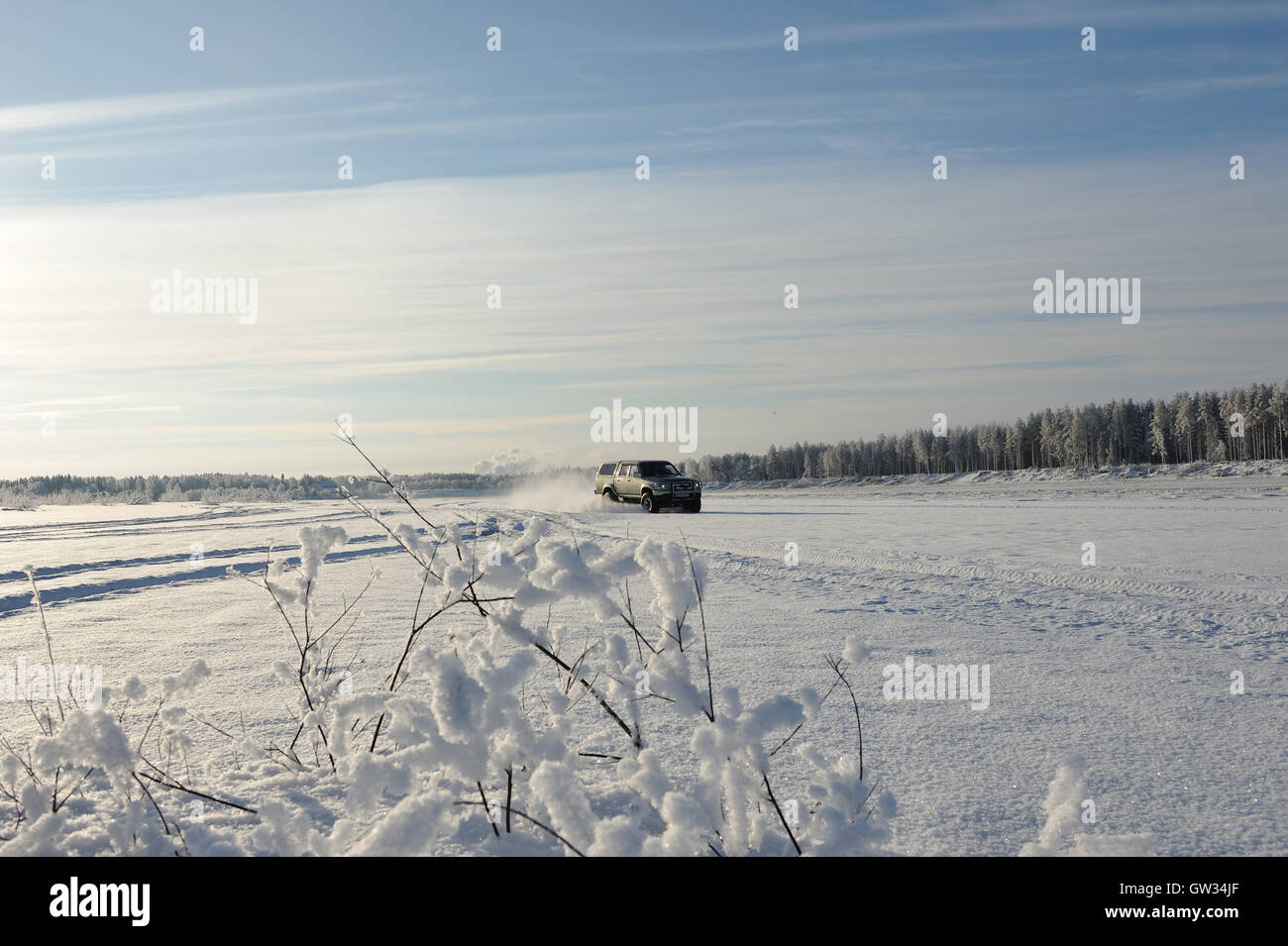 Great Wall Deer pickup driving on snowy river beach Stock Photo - Alamy