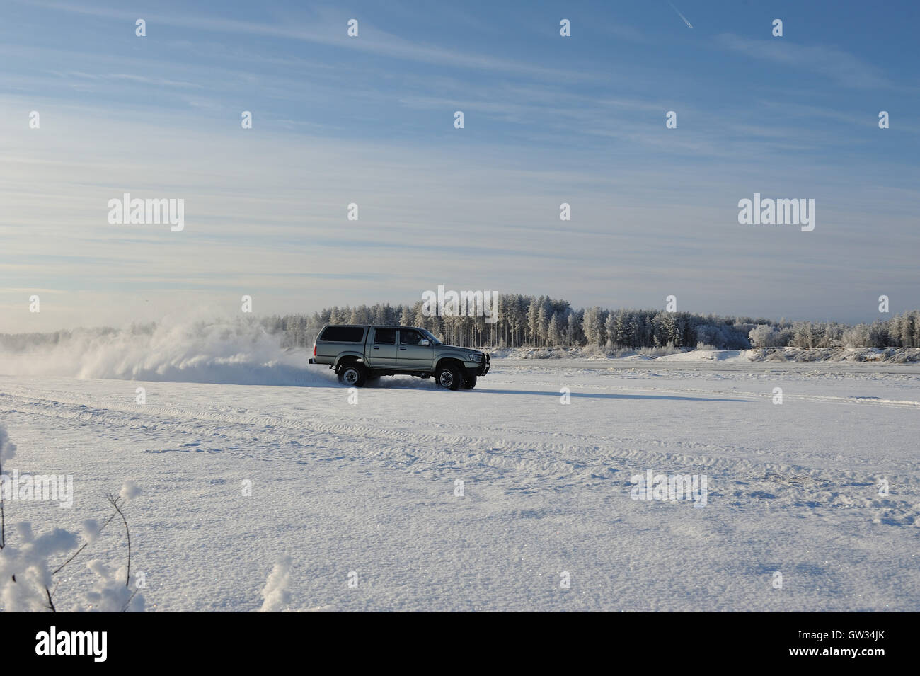 Great Wall Deer pickup driving on snowy river beach Stock Photo - Alamy