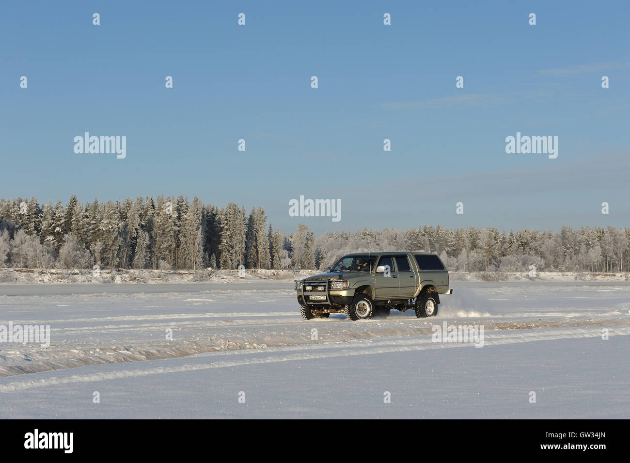 Great Wall Deer pickup driving on snowy river beach Stock Photo - Alamy