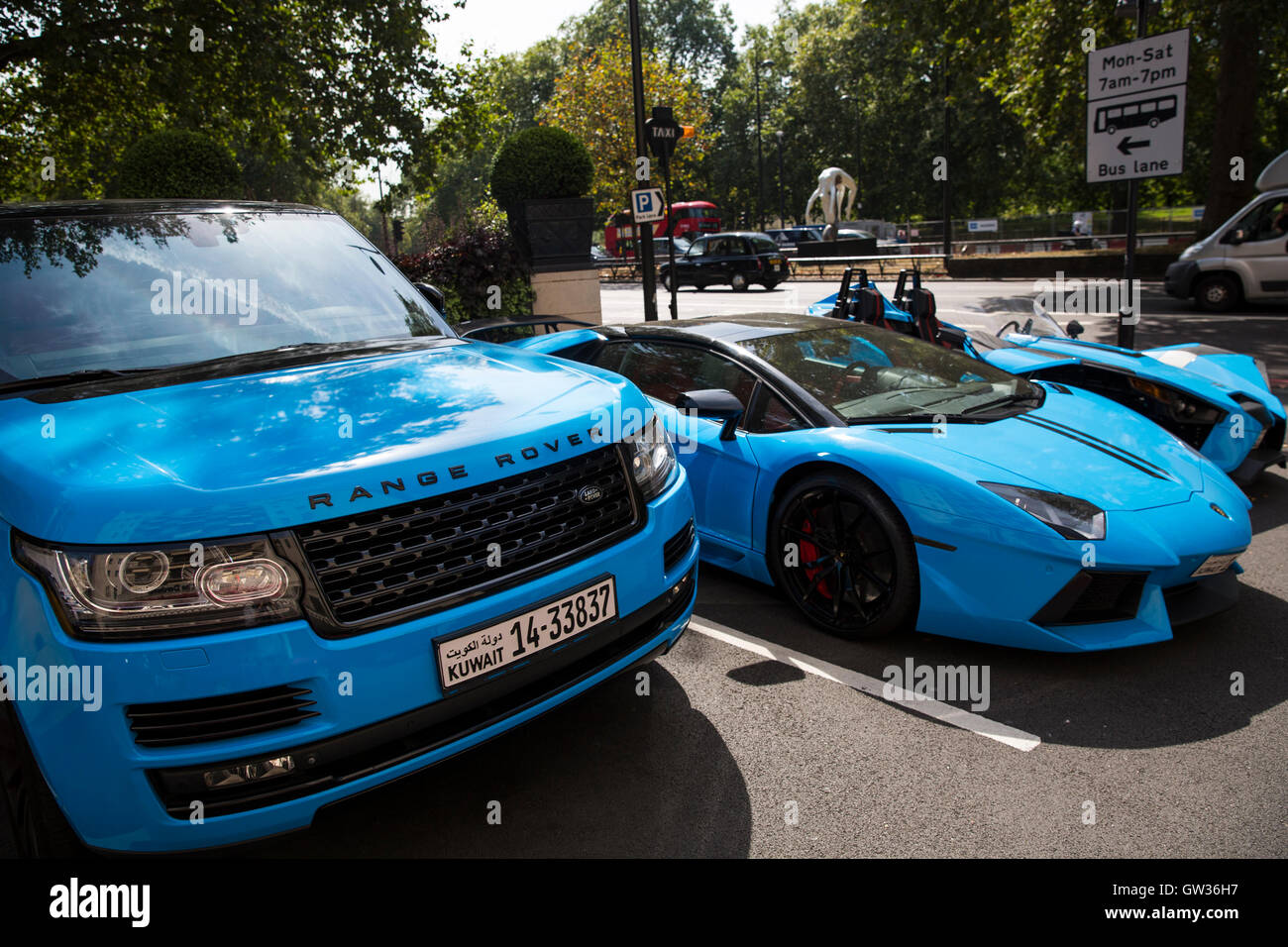 Matching blue supercars outside the Dorchester Hotel Stock Photo - Alamy