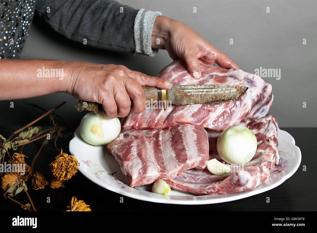 Female eating raw meat hi-res stock photography and images - Alamy