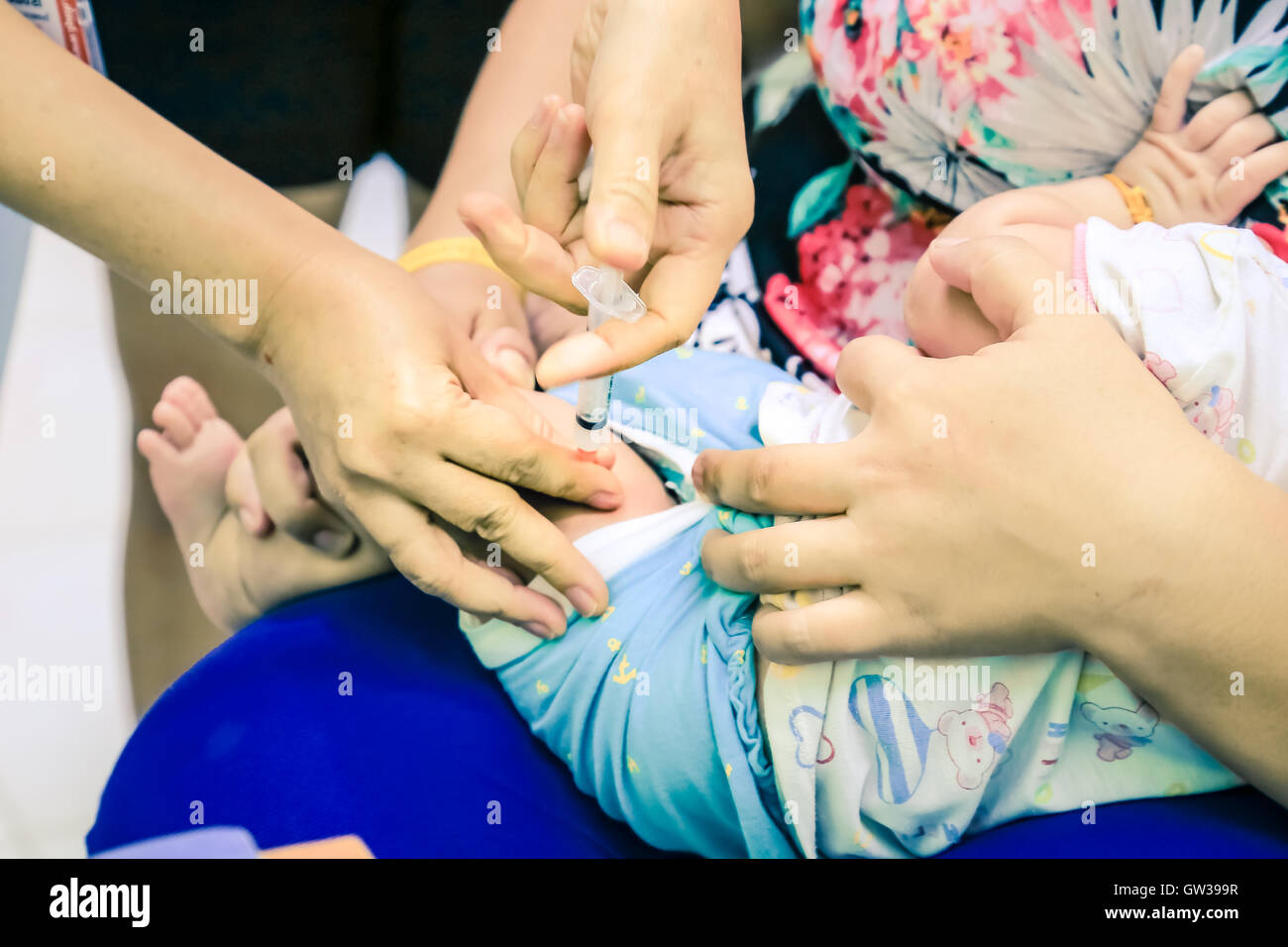 Children receiving vaccine at out side of the thigh.Children vaccine ...