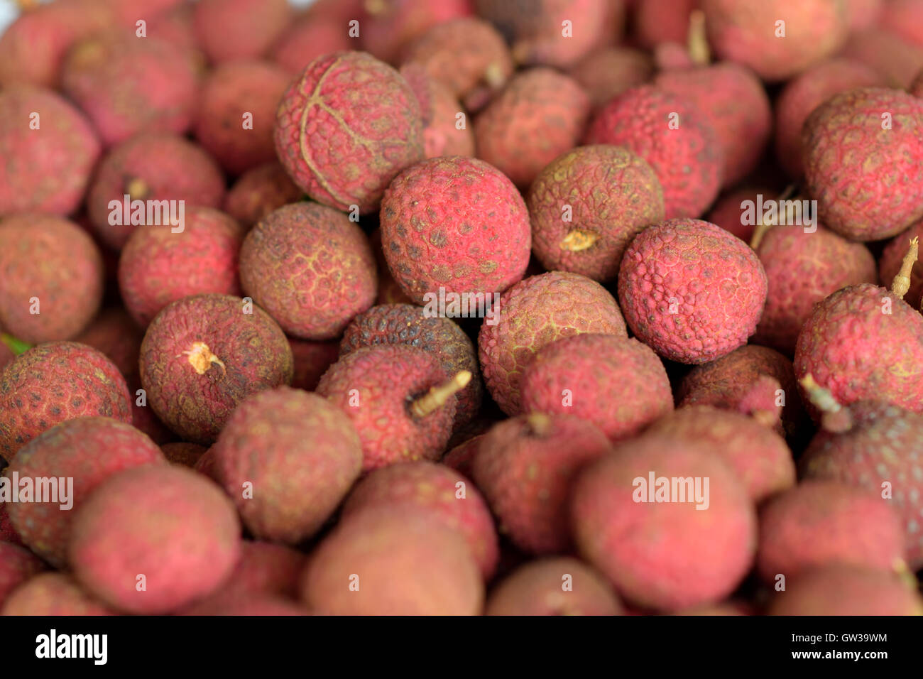 Pile ripe lychees market hi-res stock photography and images - Alamy