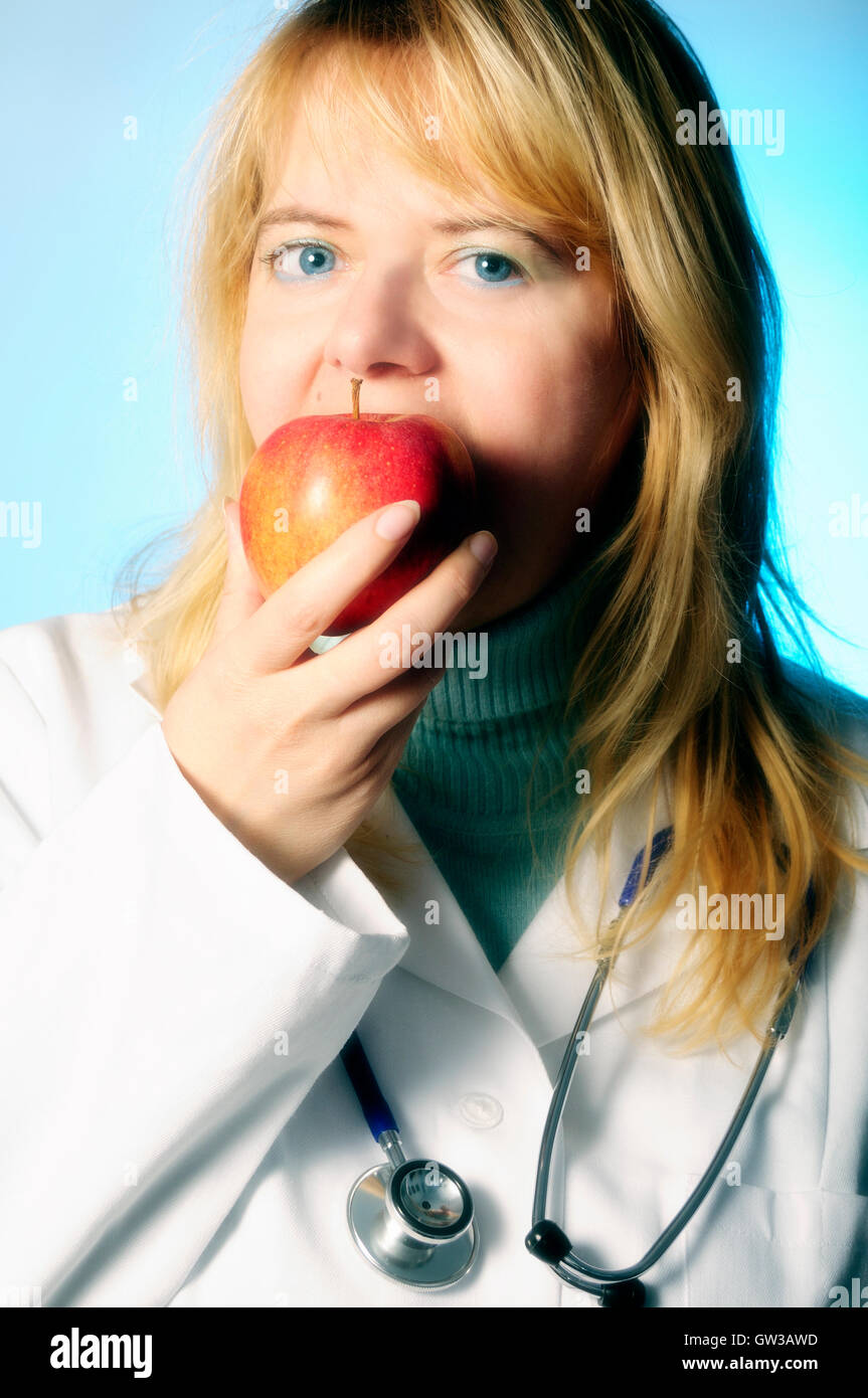an apple a day keeps the doctor away Stock Photo - Alamy