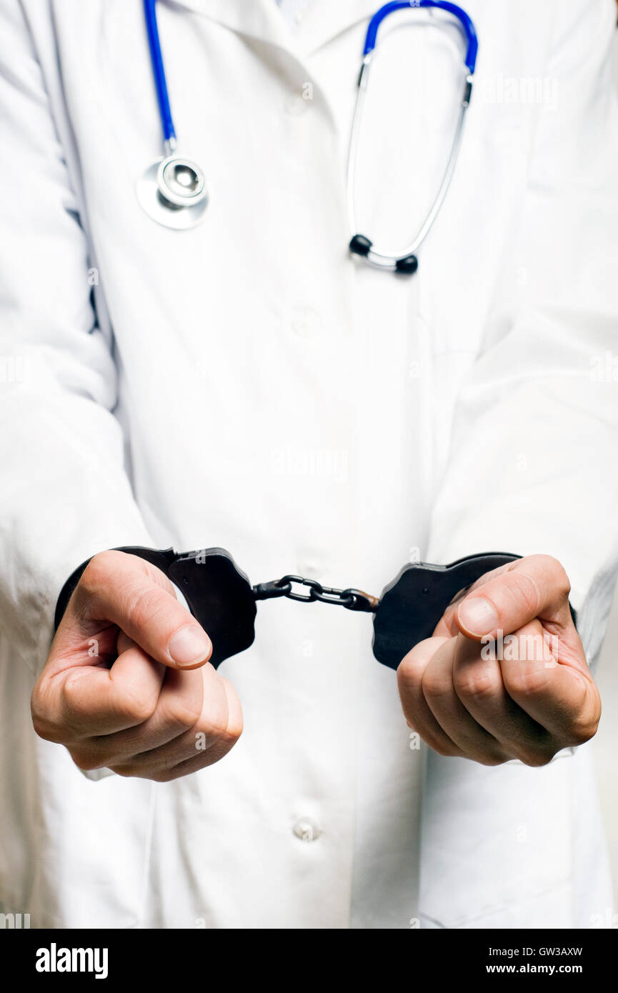 Doctor handcuffs hi-res stock photography and images - Alamy