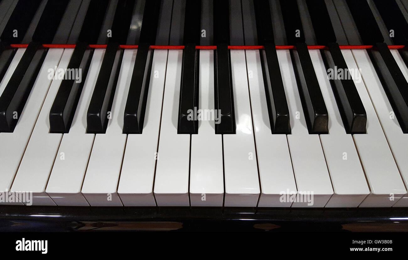 close up of piano keyboard with reflection in shiny black wood Stock ...