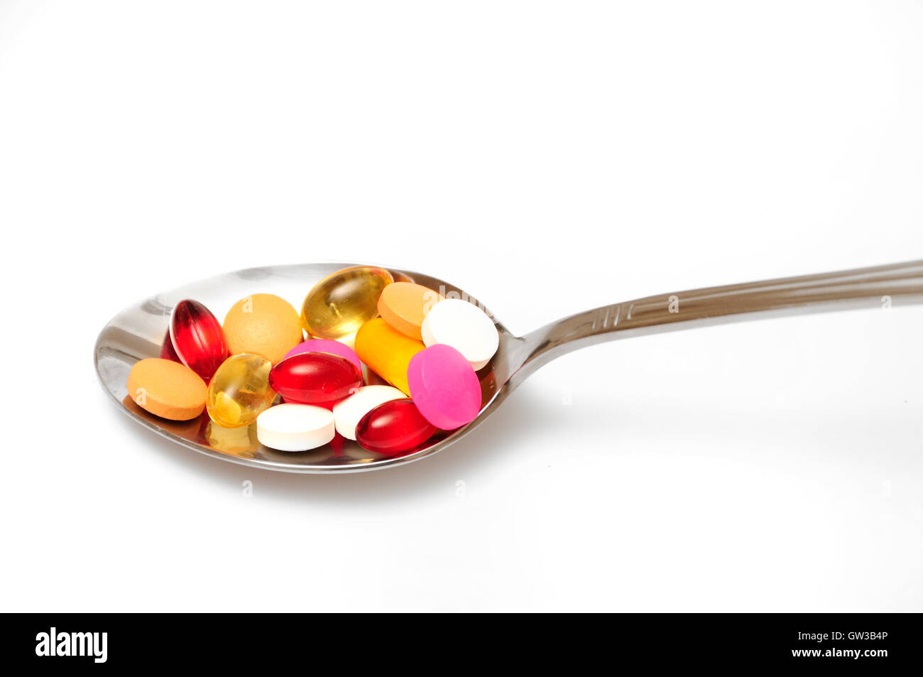 spoon full of variety of medicine pills, drugs abuse concept Stock ...