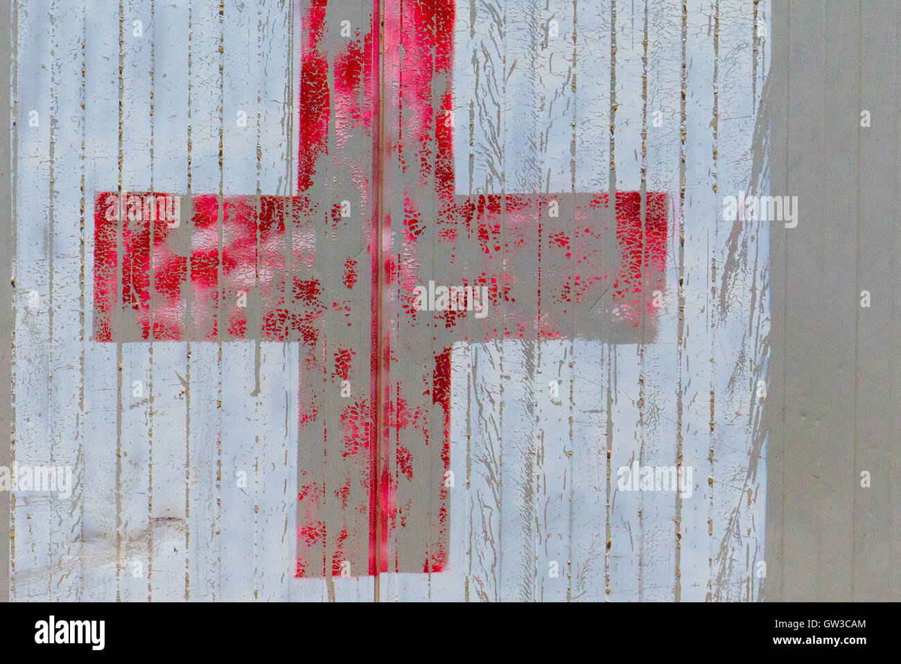 red cross symbol on side of house,old sign Stock Photo - Alamy