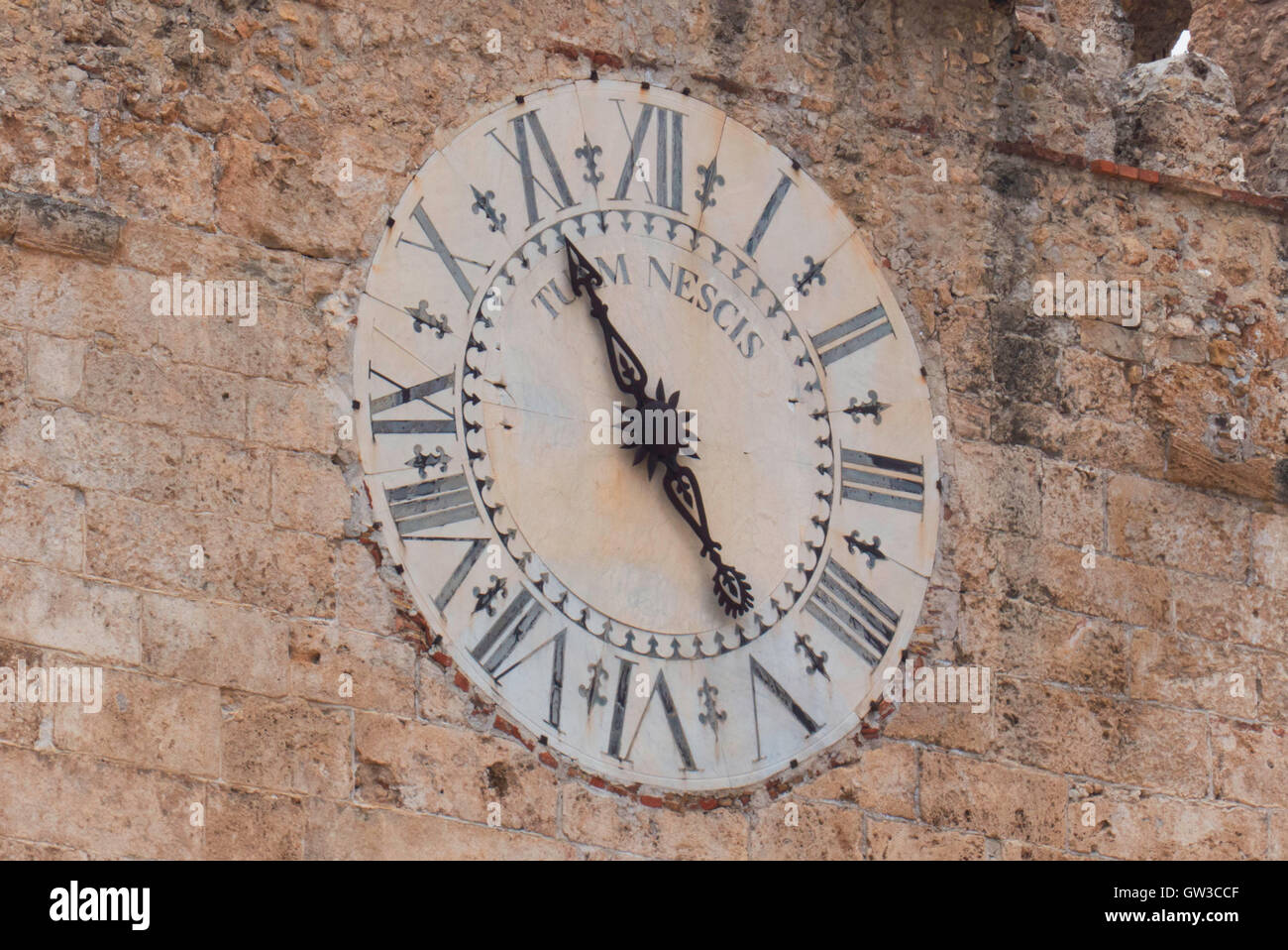 Clock face with Roman Numerals on church Sicily Stock Photo - Alamy