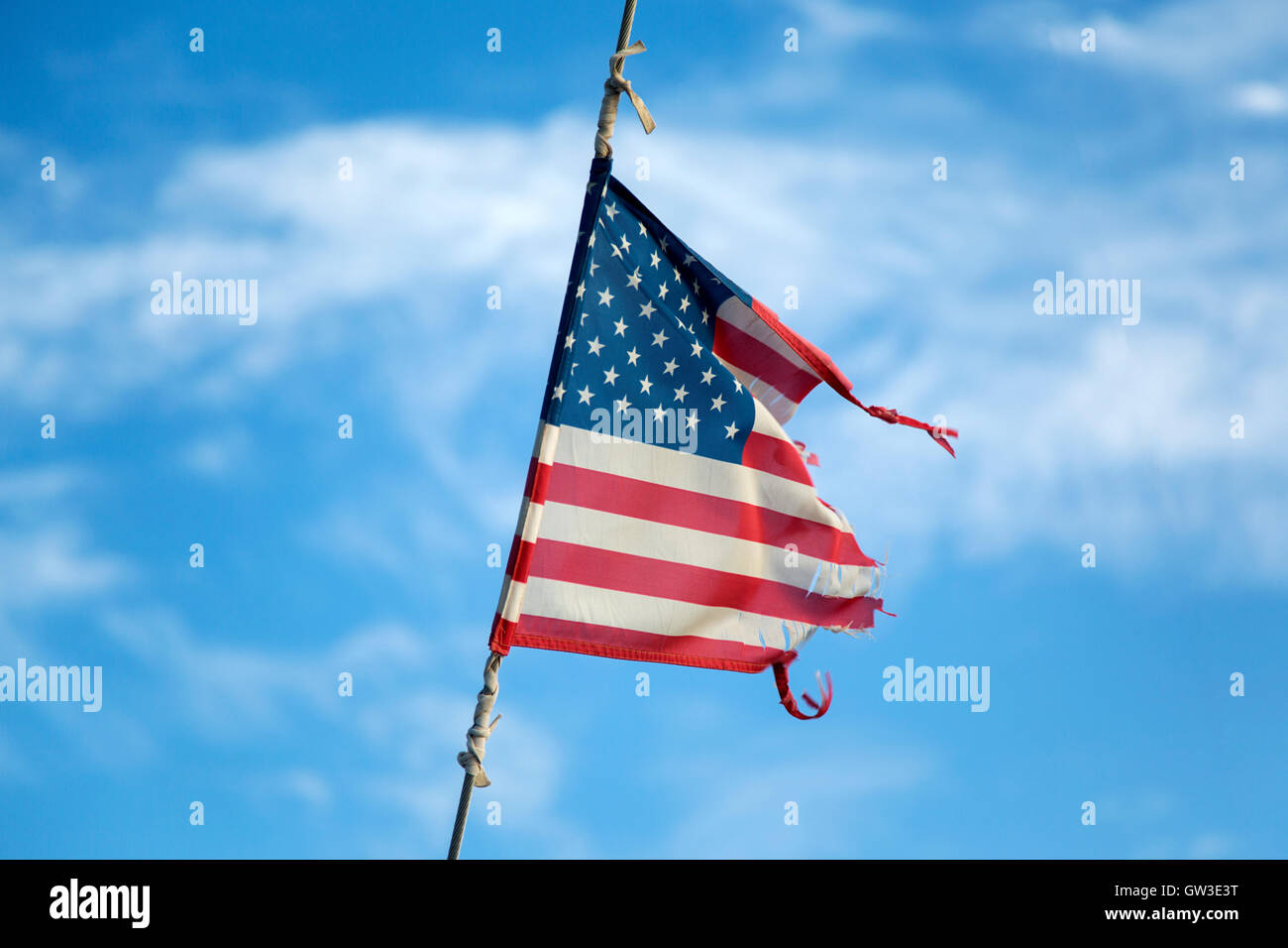 Torn red flag hi-res stock photography and images - Alamy
