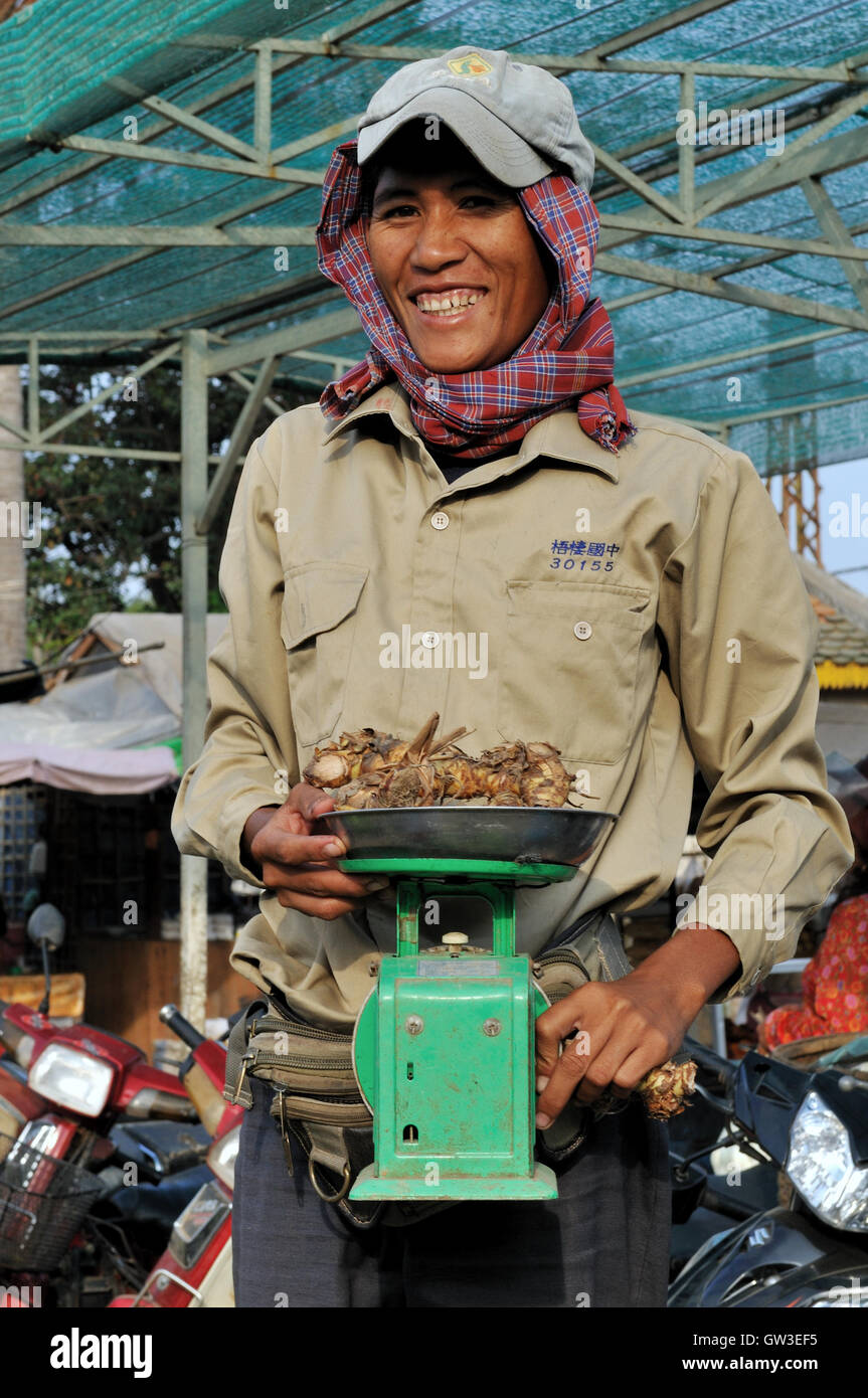 Kompong Thom, Market - female shopkeeper Stock Photo - Alamy