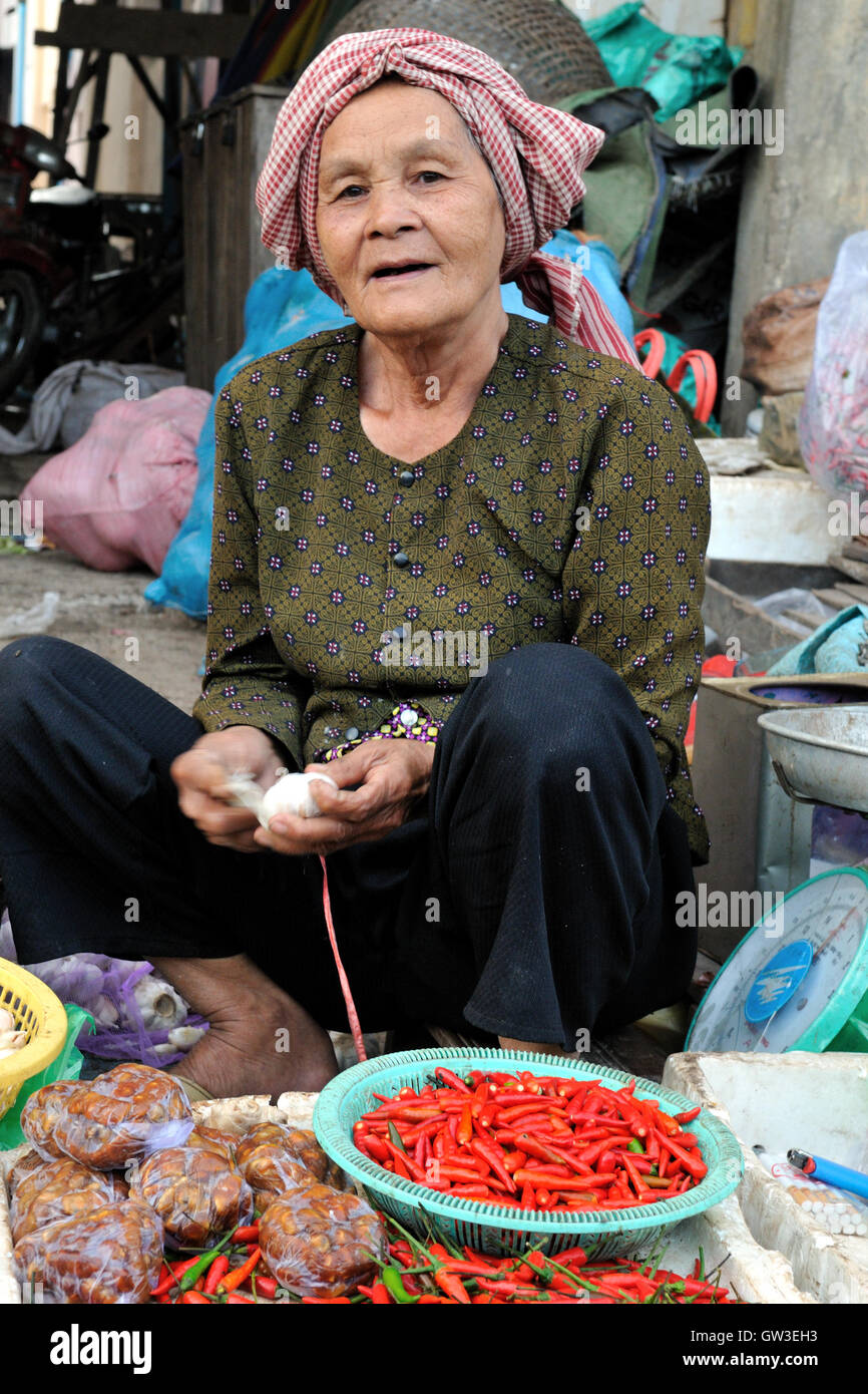 Kratié, Market - female shopkeeper Stock Photo - Alamy