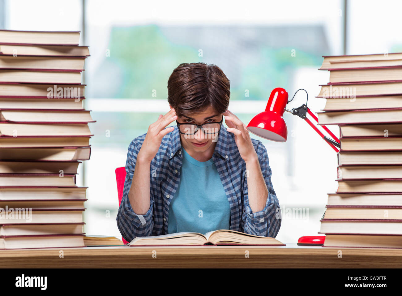 Young student under stress before exams Stock Photo - Alamy