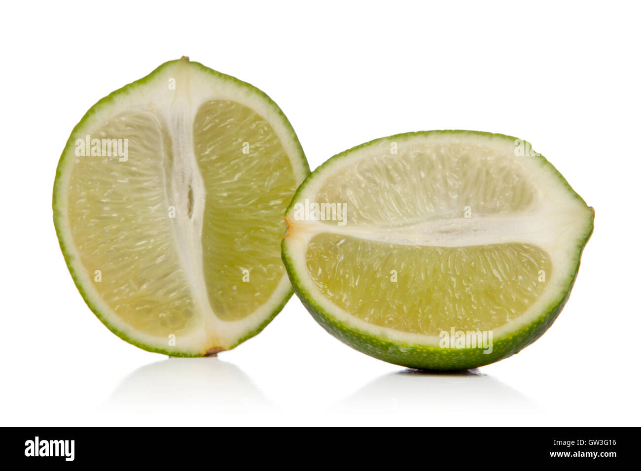 sliced lime isolated over white background Stock Photo - Alamy