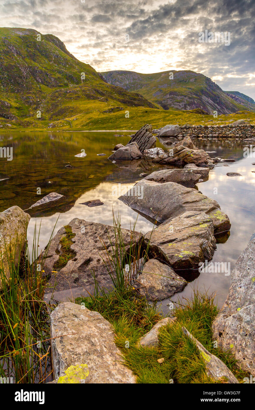 Llyn Idwal lake SNowdonia National Park Wales lies within Cwm Idwal in ...