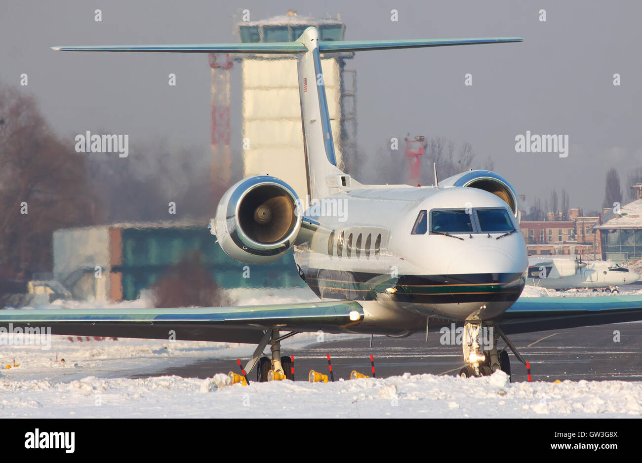 Business jet on the runway in winter getting ready for takeoff Stock ...