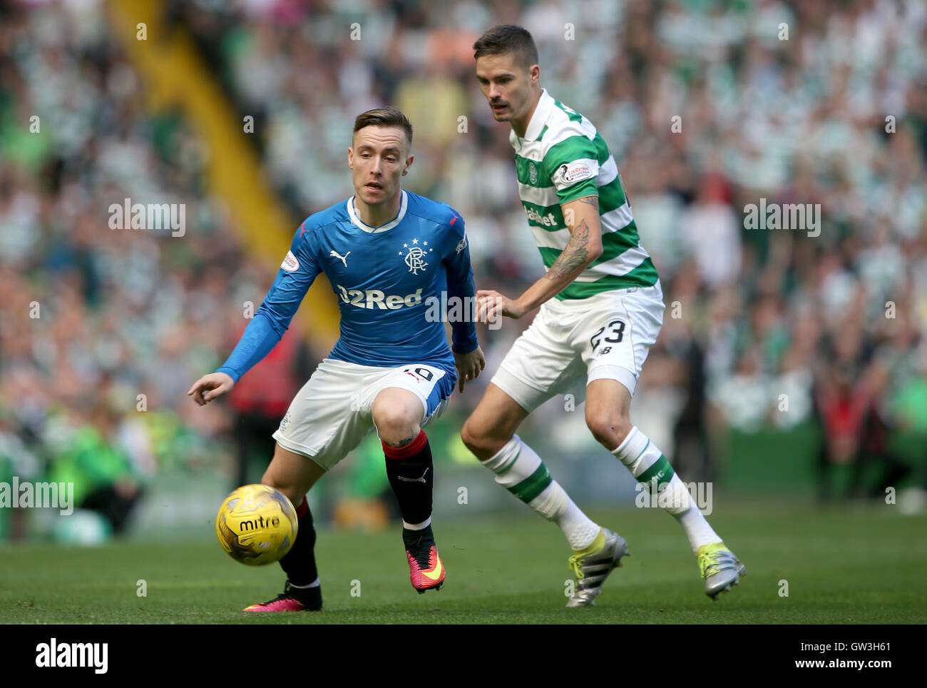 Ranger's Barrie McKay (left) and Celtic's Mikael Lustig battle for the ...