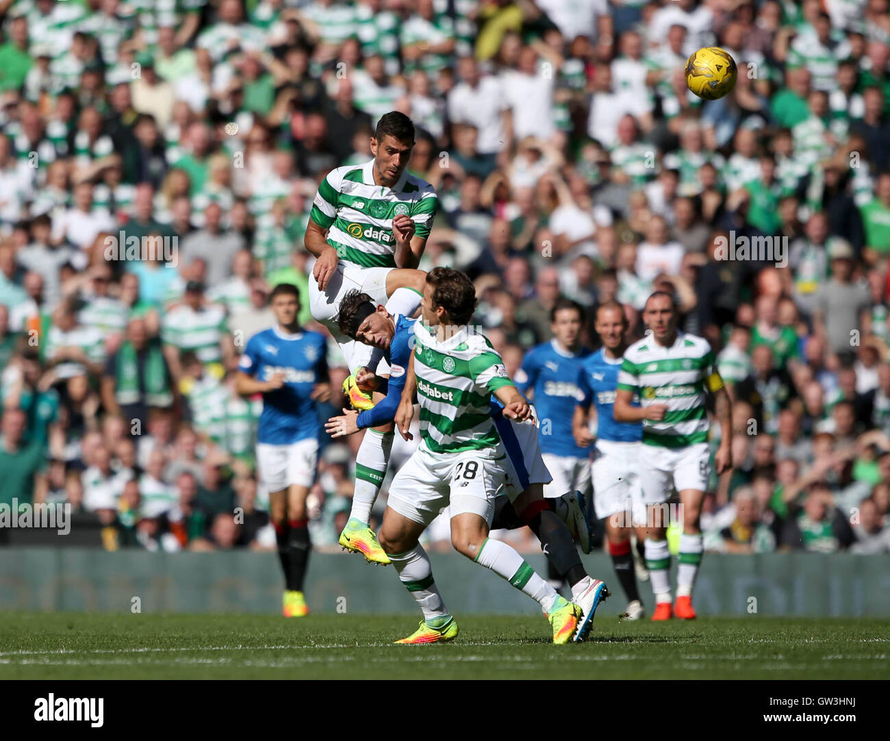 Celtic's Nir Bitton (left) and Erik Sviatchenko (right) challenge ...