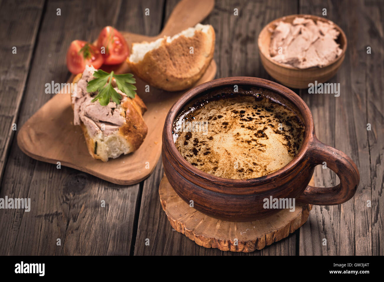Mug of coffee and pate with bread still-life Stock Photo - Alamy