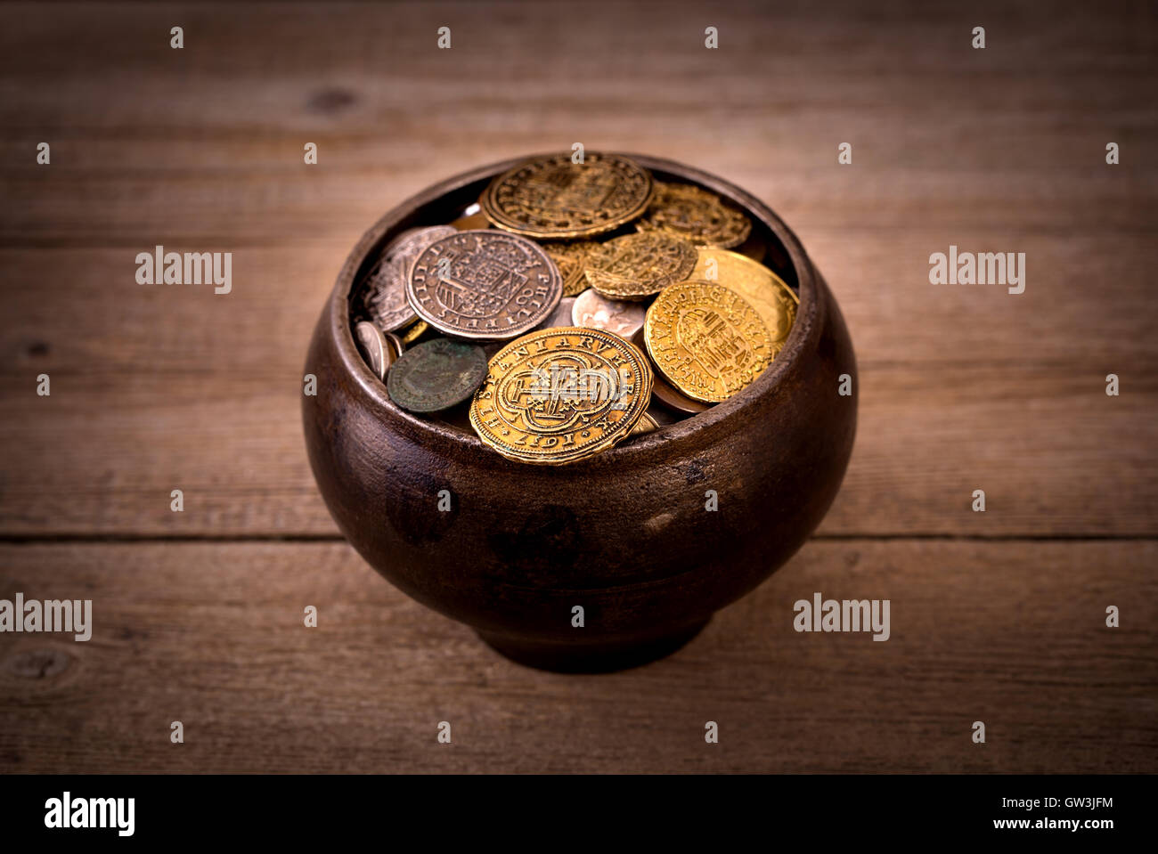 Pot of various coins Stock Photo - Alamy