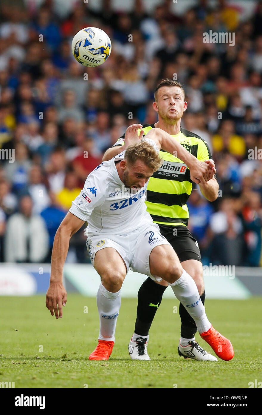 Leeds United's Charlie Taylor and Huddersfield Town's Harry Bunn battle ...
