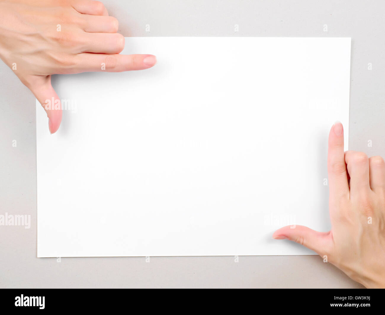 Woman hands frame over blank paper sheet. Template with copy space ...