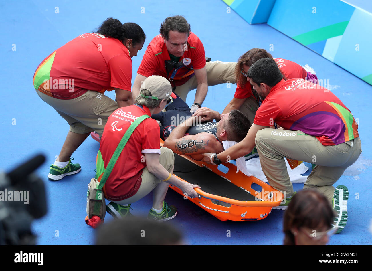 Great Britain's Joseph Townsend has to be helped on to a stretcher ...