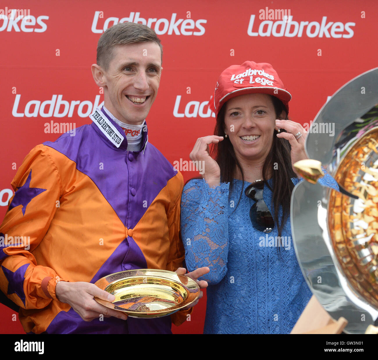 Jockey George Baker and trainer Laura Mongan celebrate after their ...
