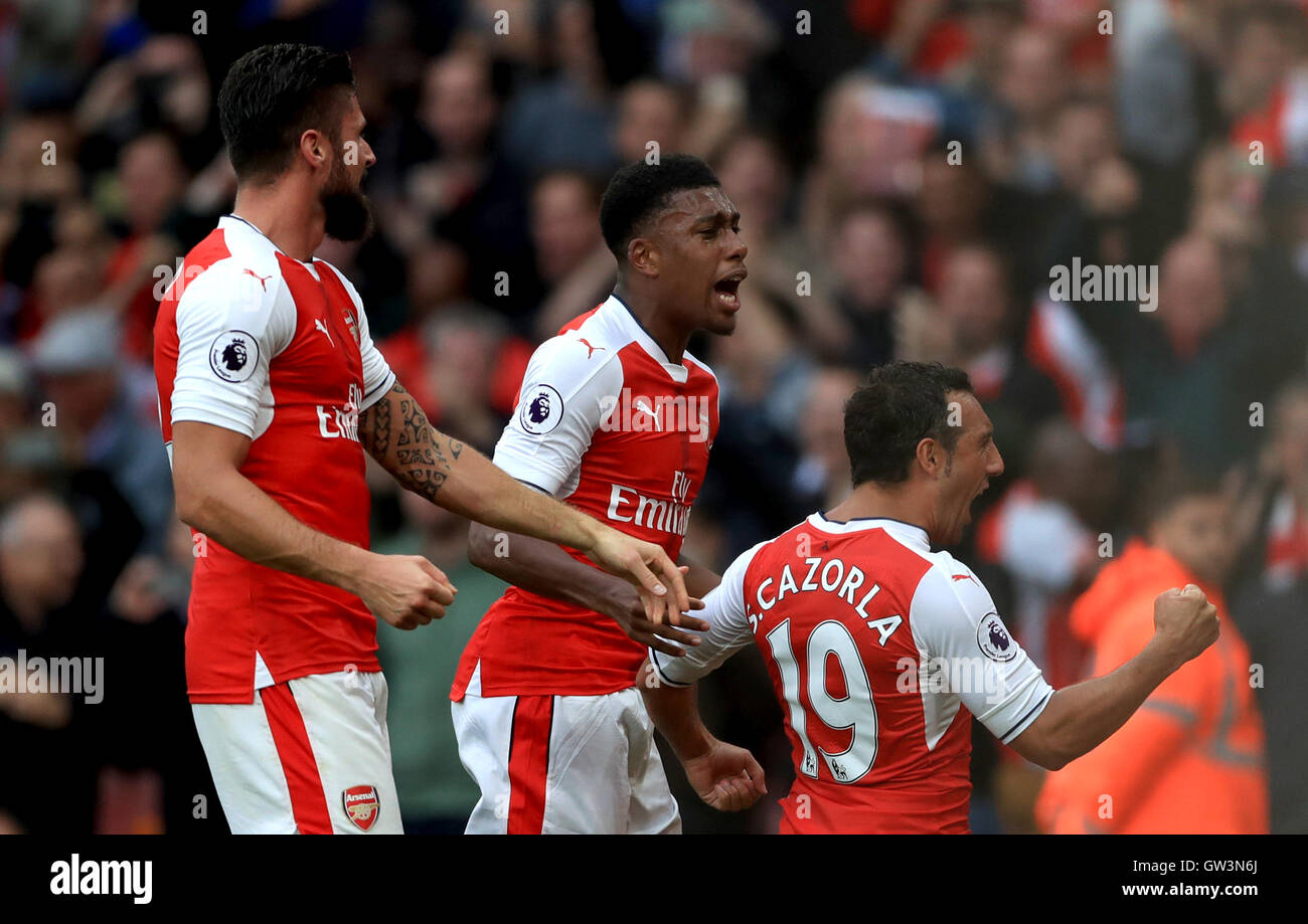 Arsenal's Santi Cazorla (right) celebrates scoring his side's second ...