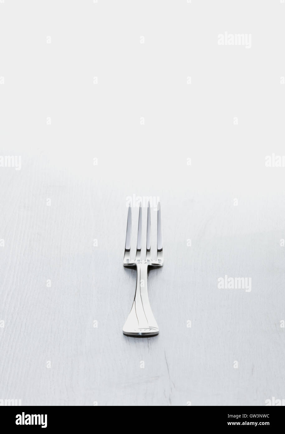 one fork, use to show the restaurants standing Stock Photo - Alamy
