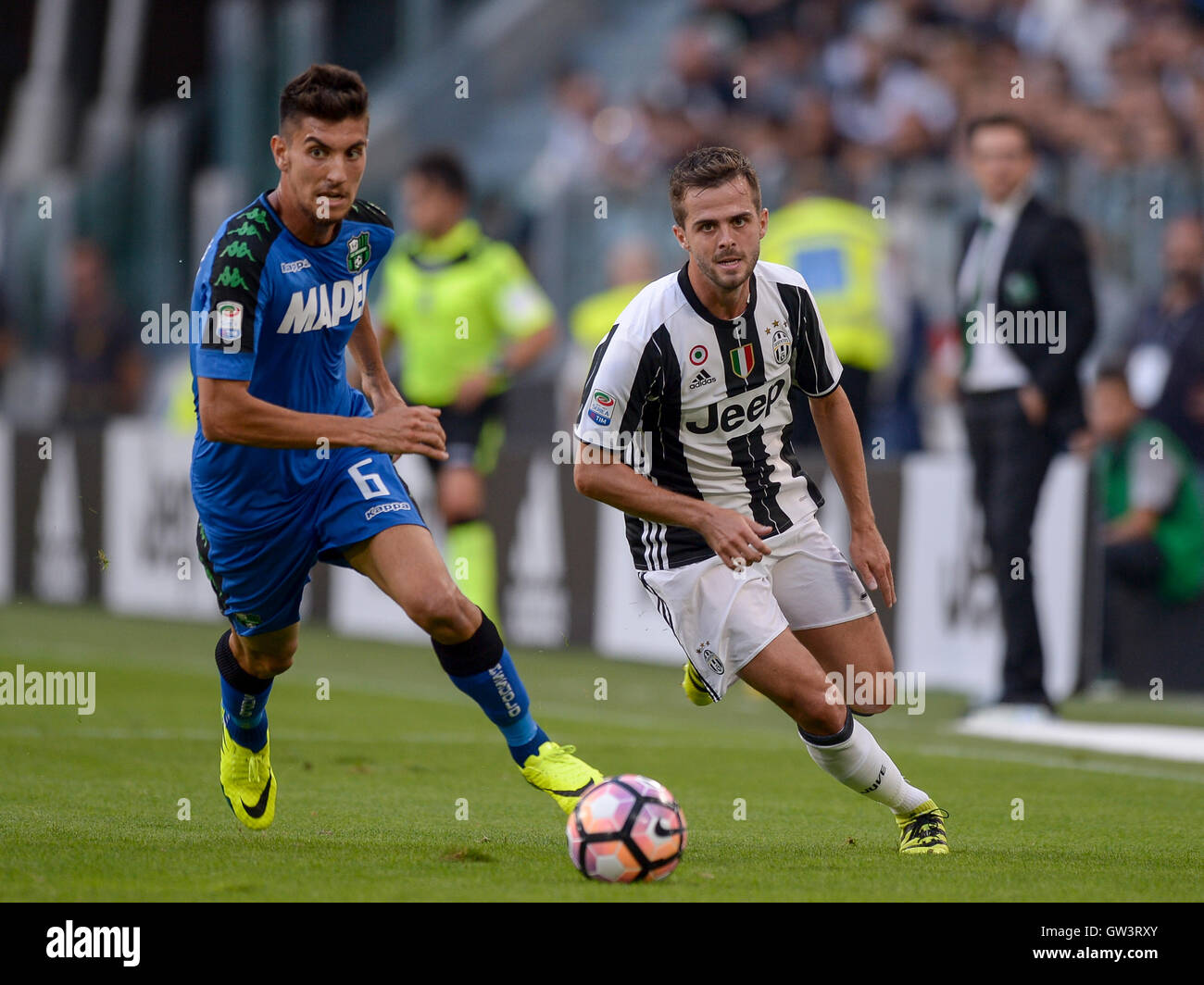 Turin, Italy. 10th Sep, 2016. Lorenzo Pellegrini (left) and Miralem ...
