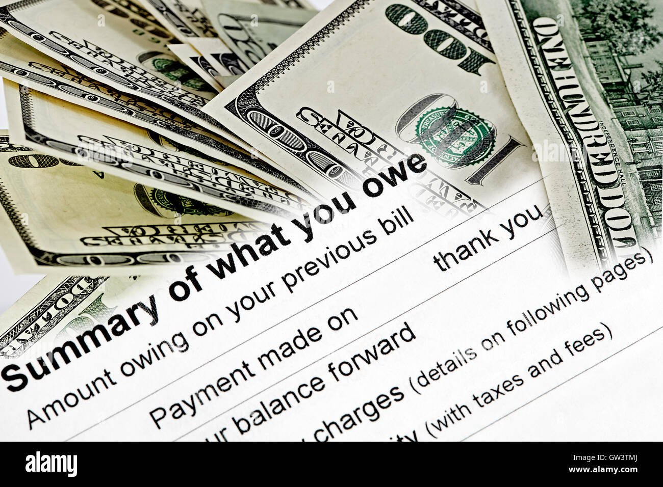 Summary of what is owed on a statement with US Currency Stock Photo - Alamy
