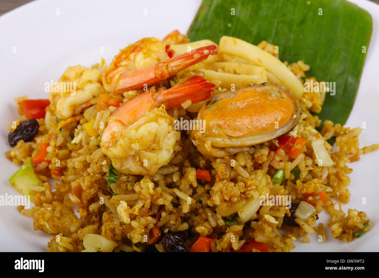 Fried rice with seafood - shrimp, mussel, squid Stock Photo - Alamy