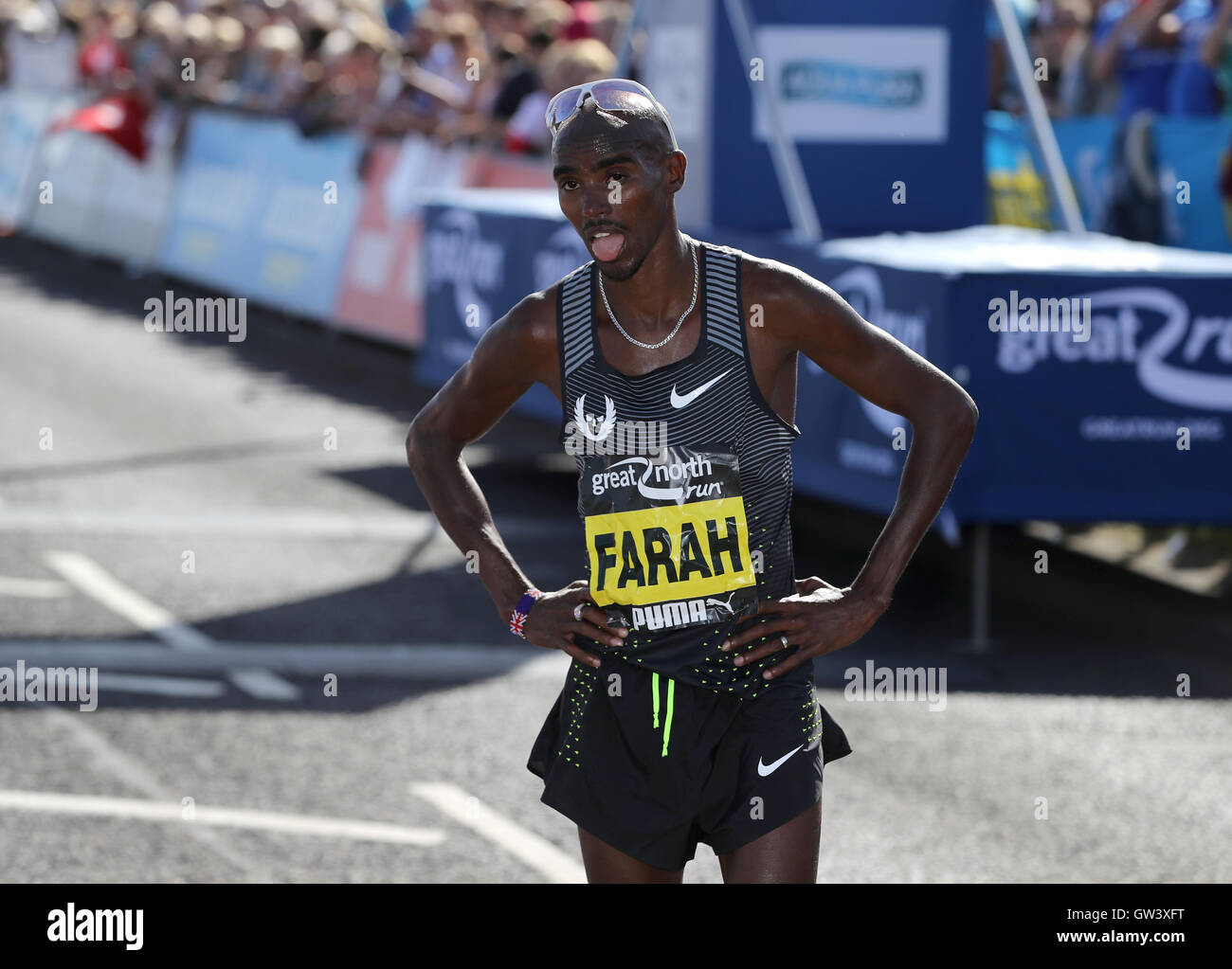 Great Britain's Mo Farah after crossing the finish line to win the Men ...
