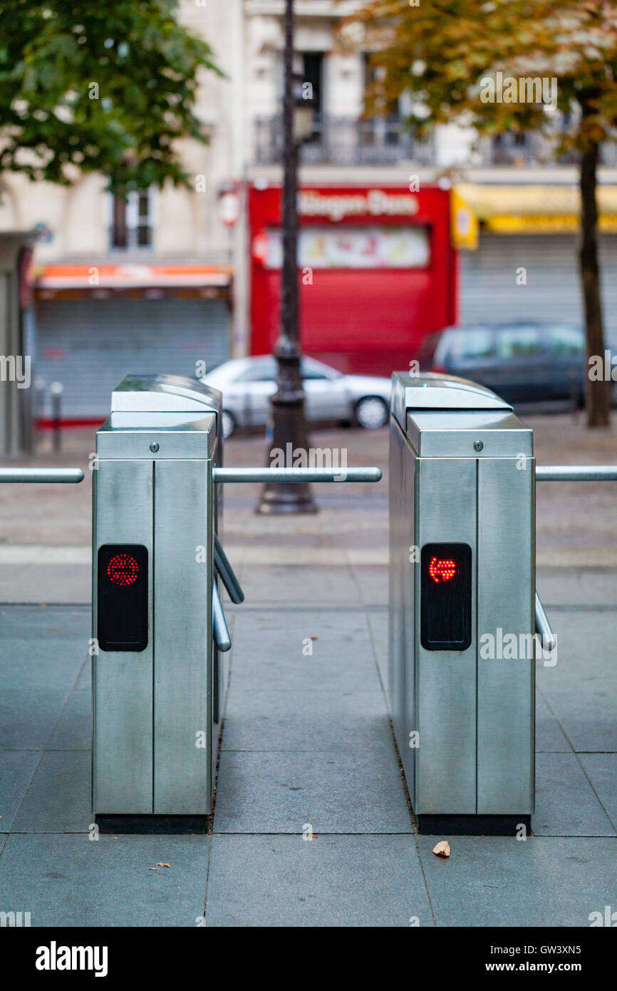 Subway turnstyle showing the no-entry red sign Stock Photo - Alamy