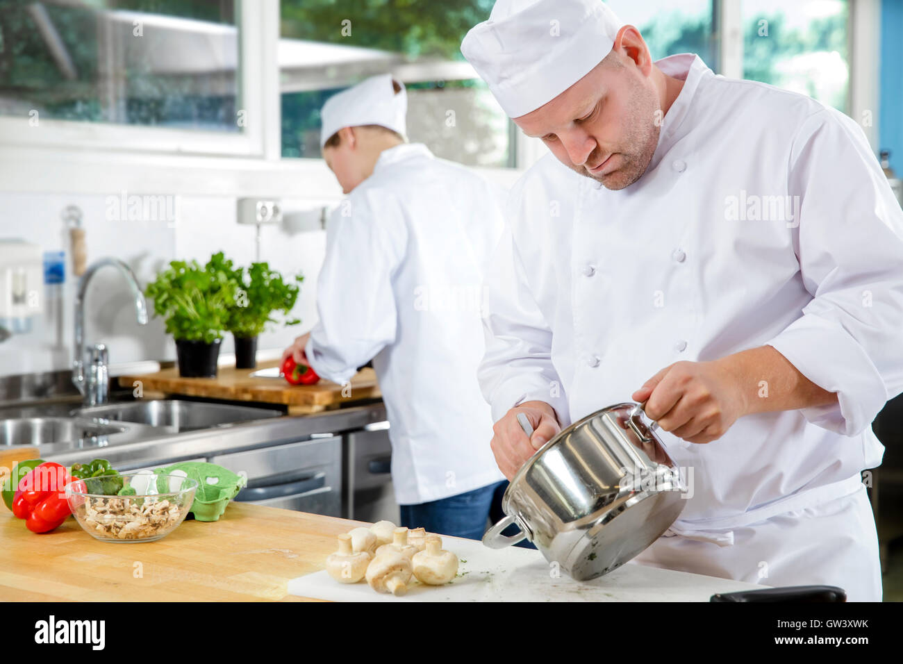 Chef in kitchen restaurant makes hi-res stock photography and images ...