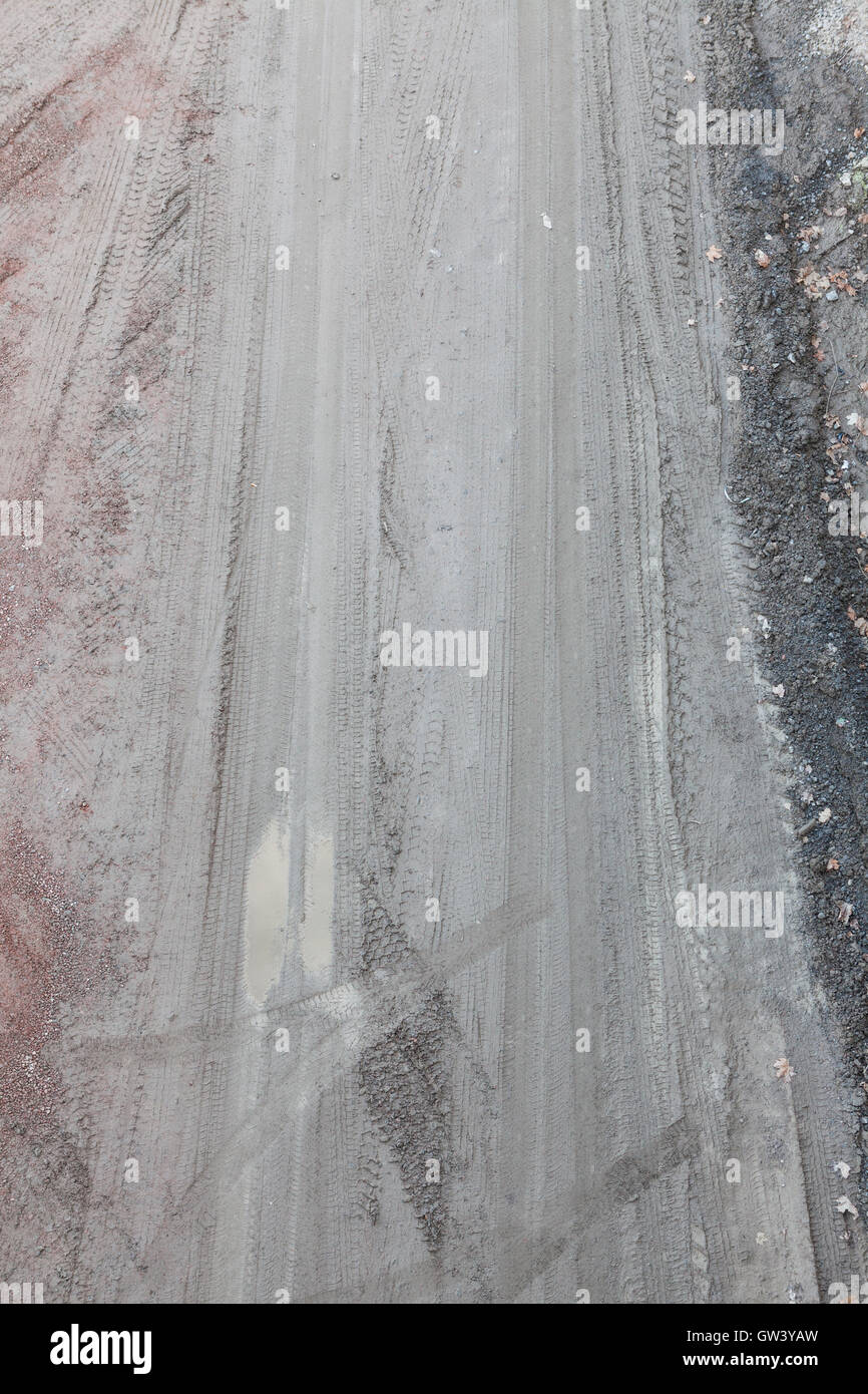 Muddy dirt road and tire tracks Stock Photo - Alamy