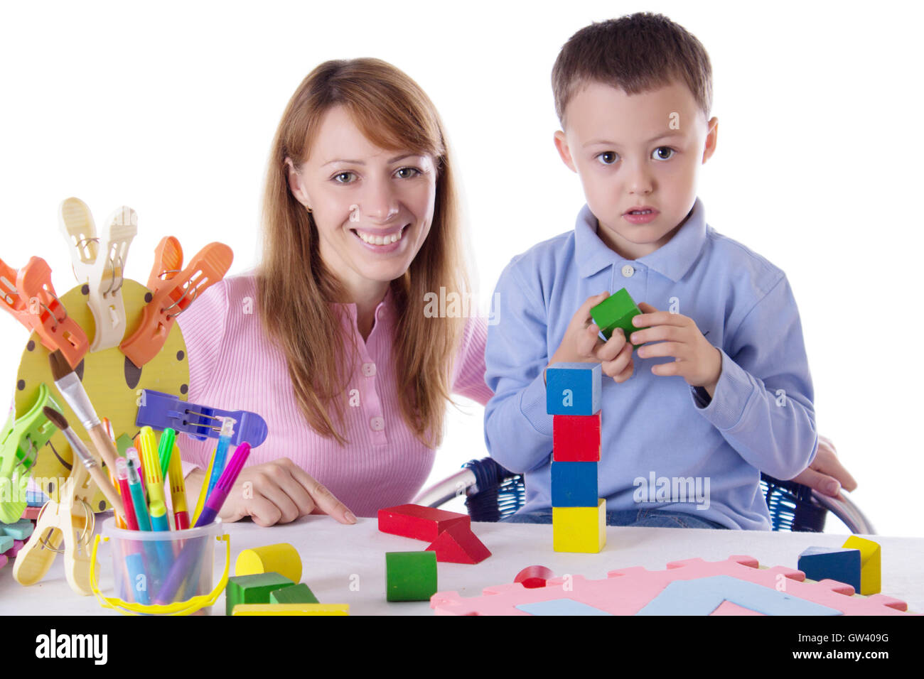 Mother and son playing with cubes Stock Photo - Alamy
