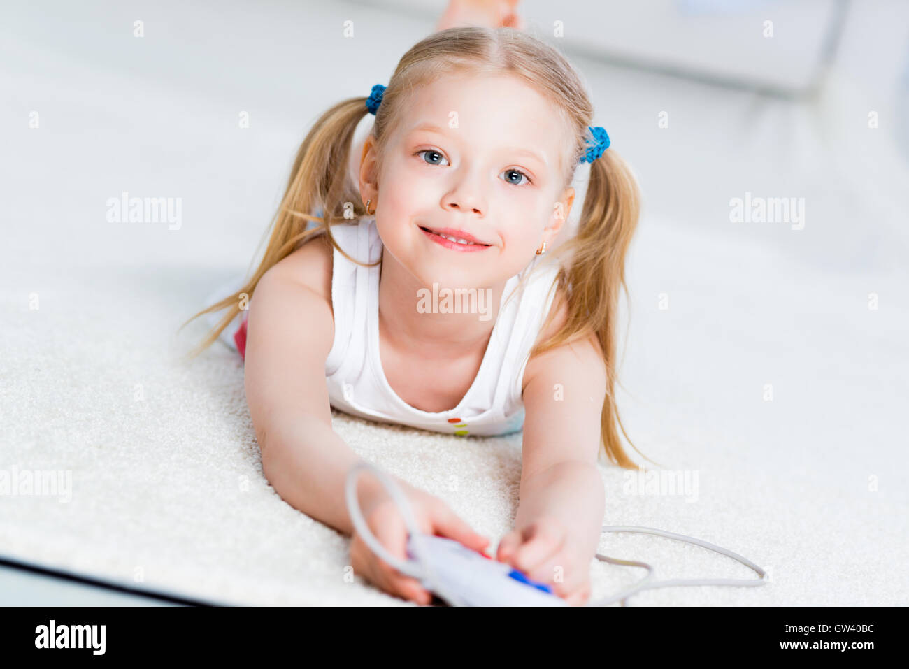 girl playing on a game console Stock Photo - Alamy