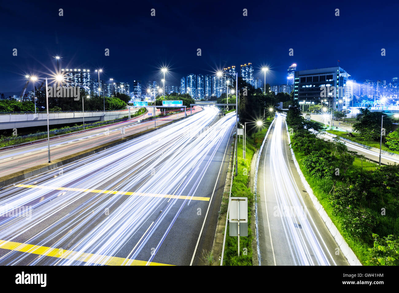 Busy traffic on highway at night Stock Photo - Alamy