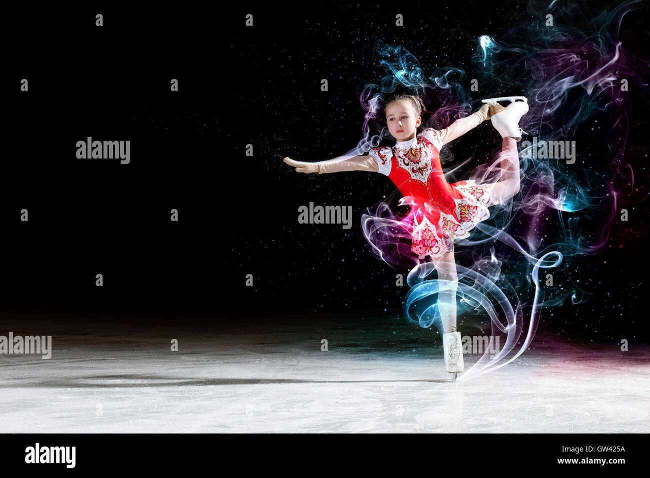 Little girl figure skating Stock Photo - Alamy