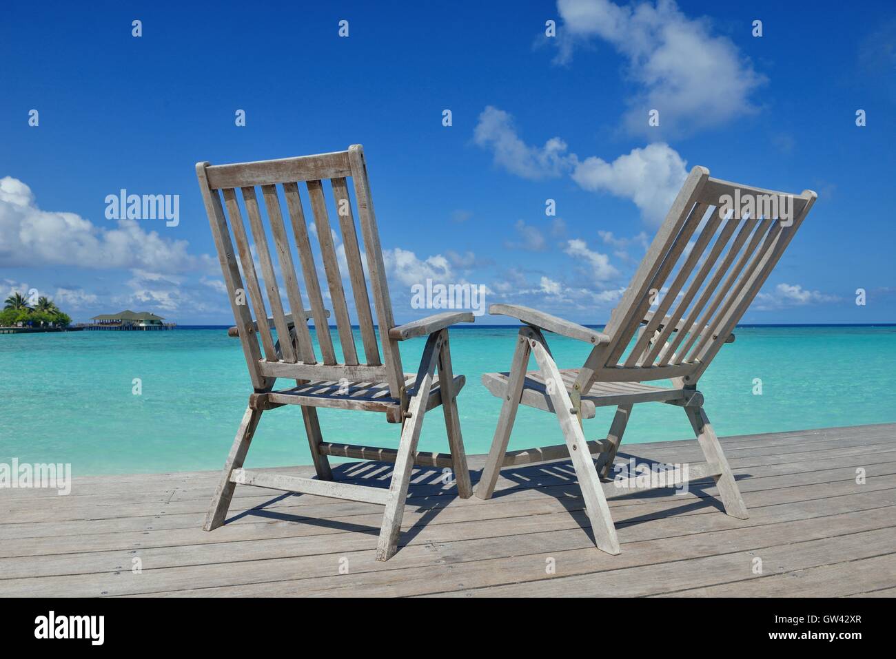 tropical beach chairs Stock Photo - Alamy