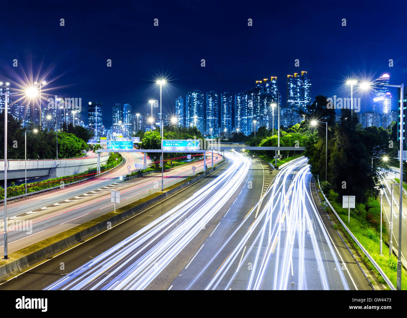 Busy traffic on highway at night Stock Photo - Alamy