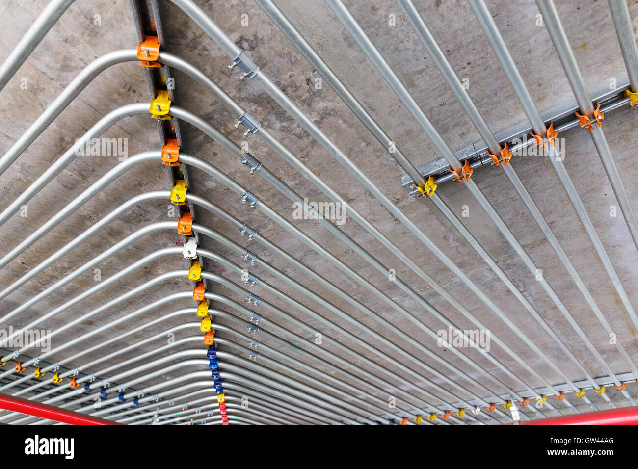 Pipes on ceiling wall Stock Photo - Alamy