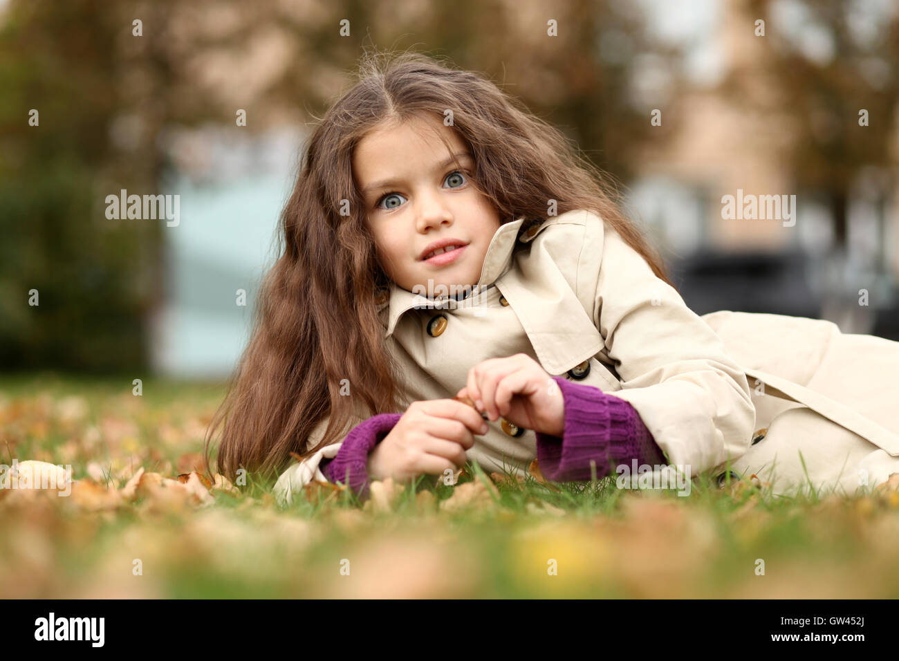 little girl in the autumn park Stock Photo - Alamy