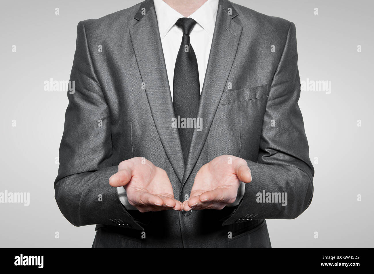Businessman cupped hands Stock Photo - Alamy