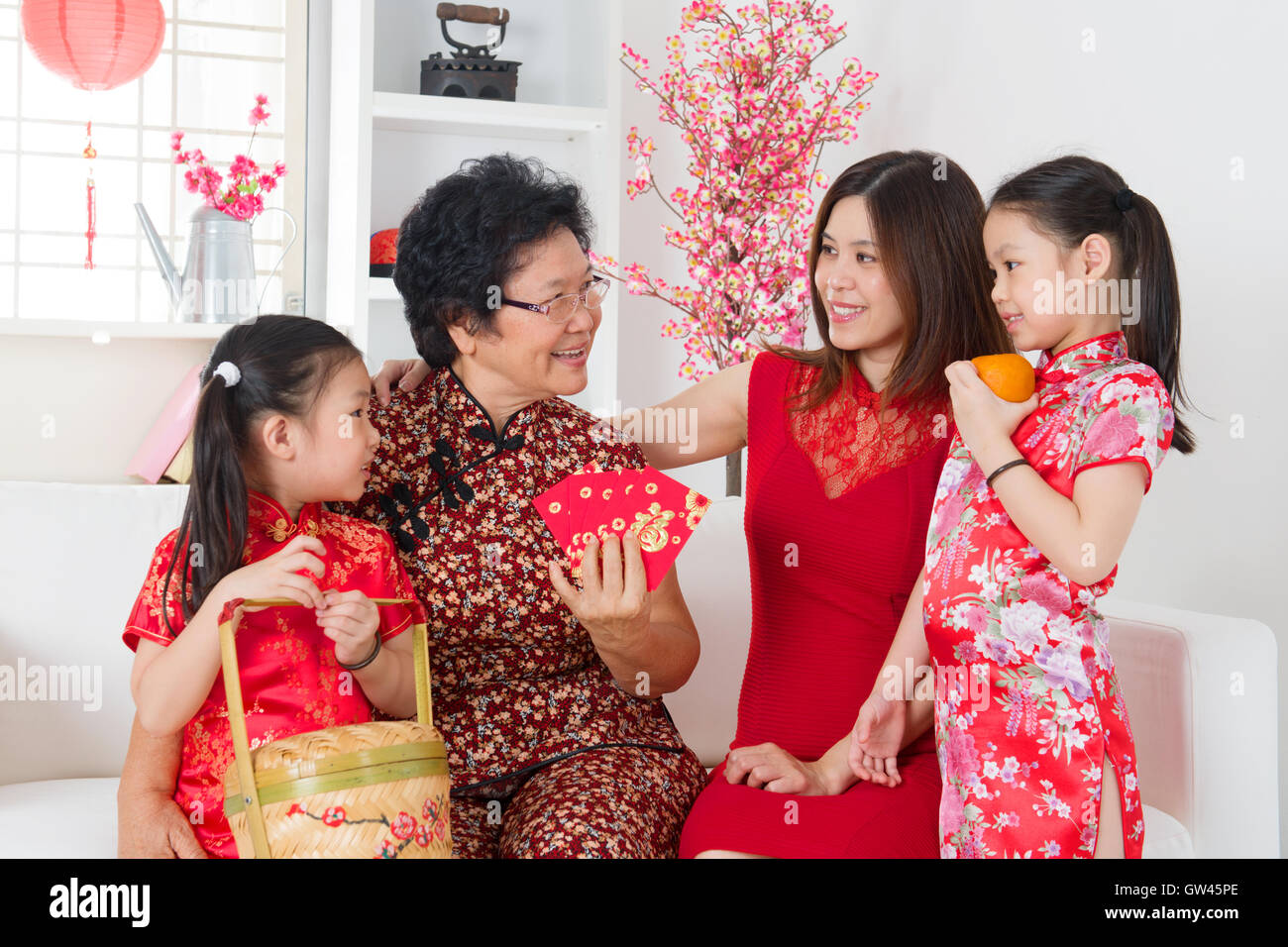 Asian family celebrate Chinese new year at home Stock Photo - Alamy