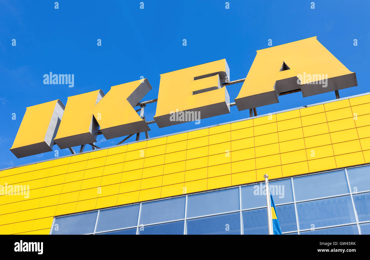 IKEA logo against blue sky Stock Photo - Alamy