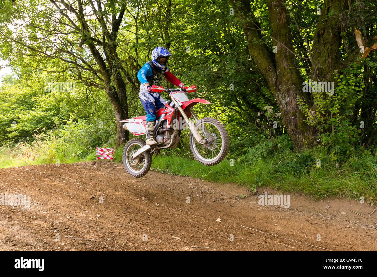 enduro rider junping Stock Photo - Alamy