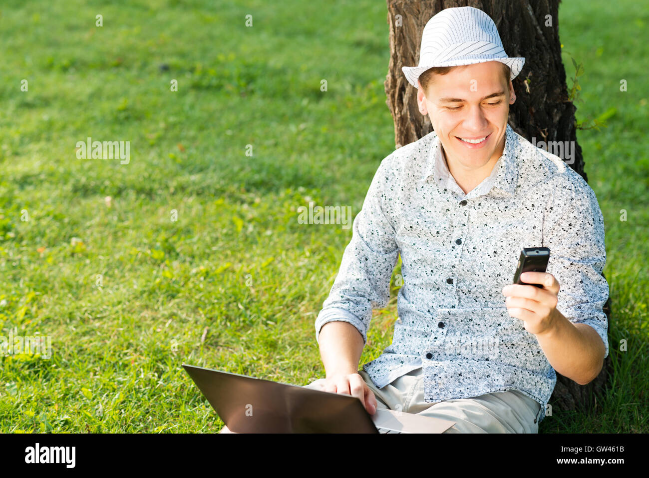 young man with a cell phone Stock Photo - Alamy